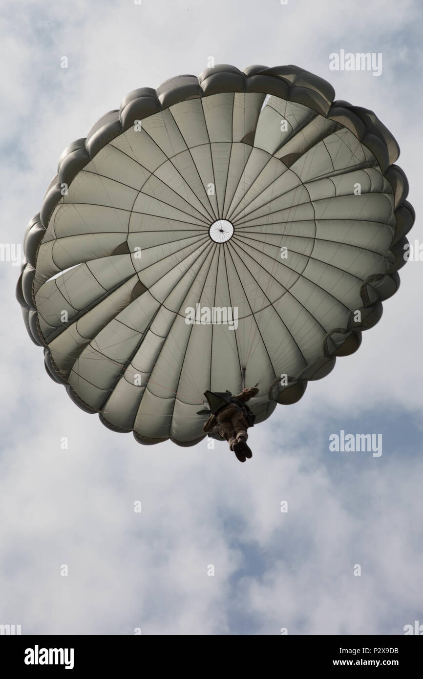 A British Army Paratrooper parachuties onto a Drop Zone during Leapfest ...