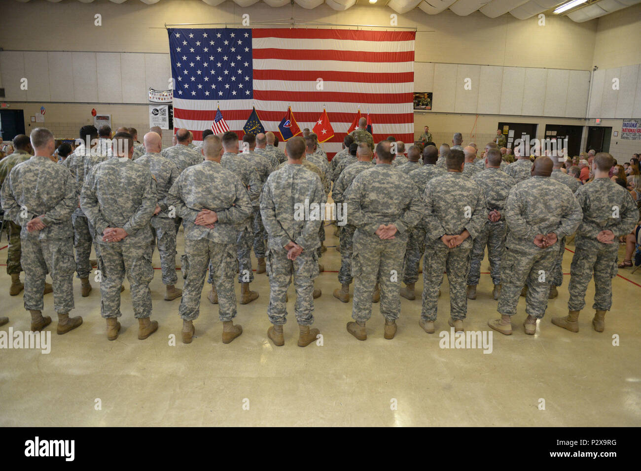 Cuba-bound soldiers with the 38th Infantry Division listen to their ...