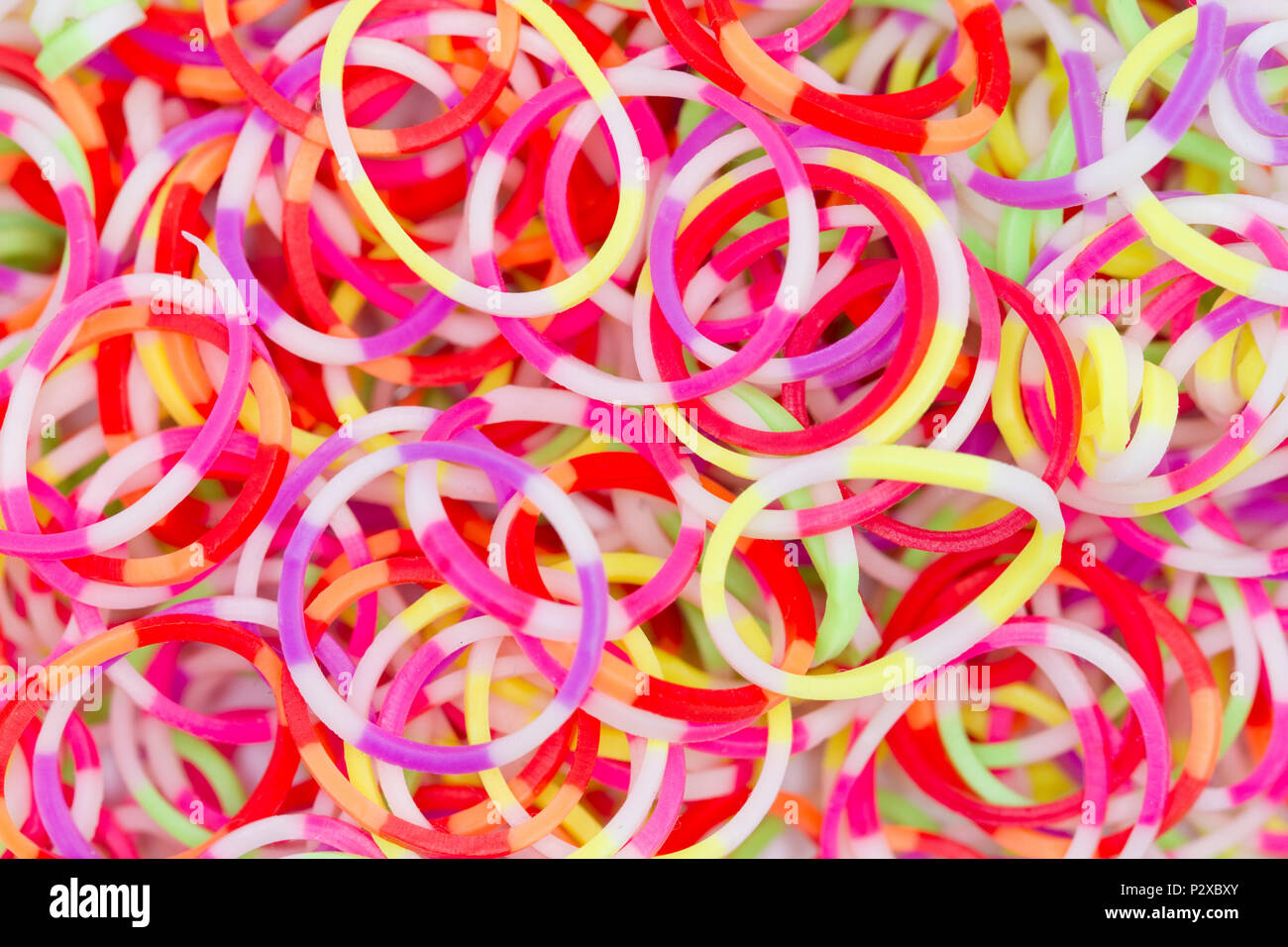Colorful elastic rubber pile Stock Photo - Alamy