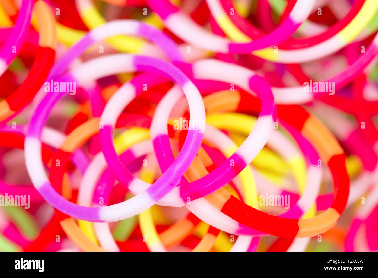 Colorful elastic rubber pile Stock Photo - Alamy