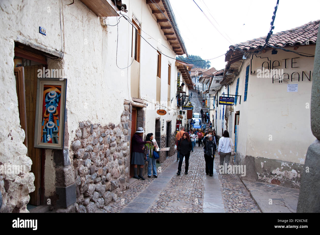 A typical narrow street with its cobbled paving in Cusco, Peru South ...