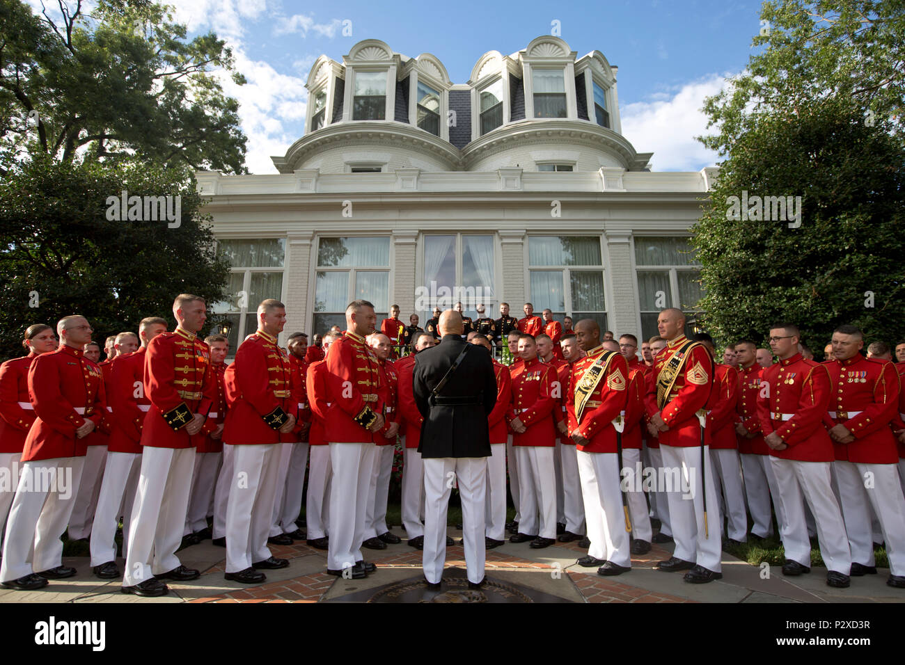 Commandant of the Marine Corps Gen. Robert B. Neller, center, speaks to ...