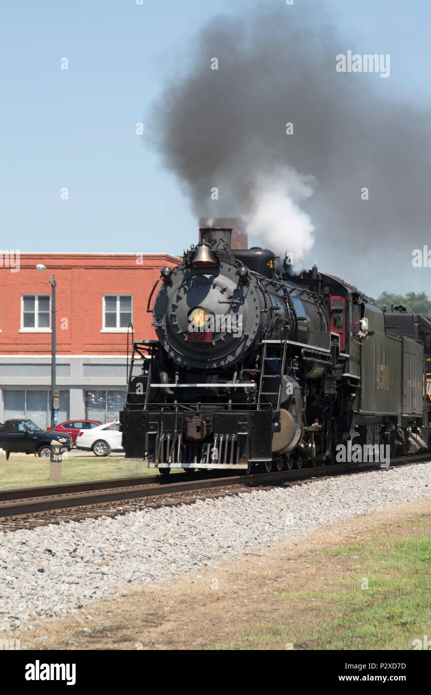 A restored steam engine Locomotive runs through Pulaski Virginia Stock ...