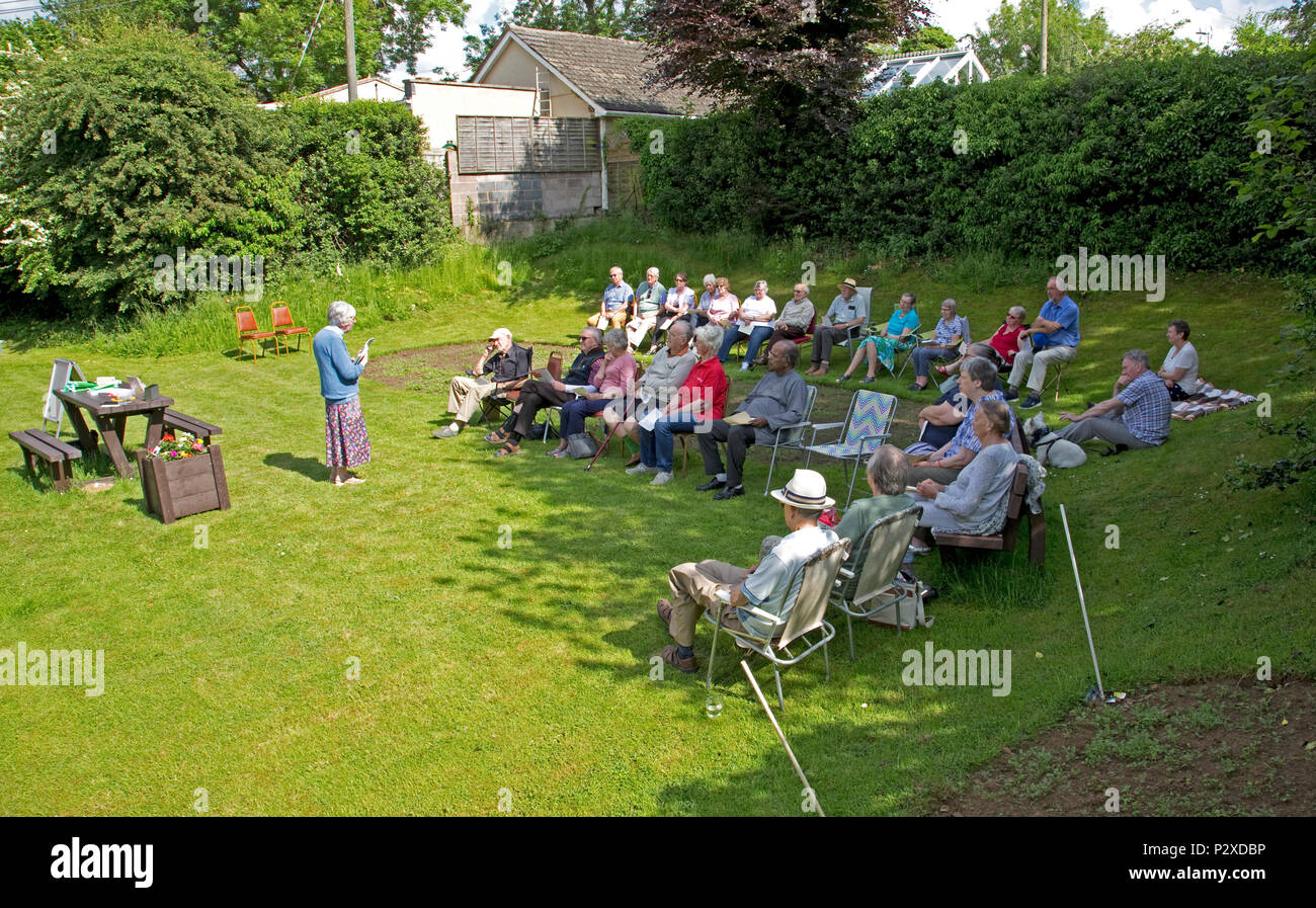 Church group meeting in community wildlife garden behind Methodist ...
