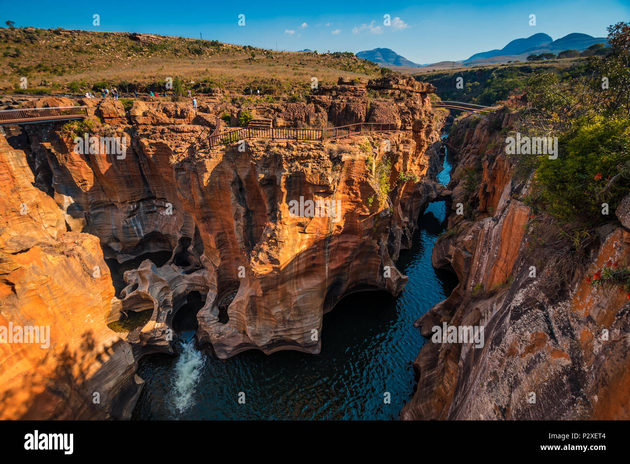 A wide shot of Bourke’s Luck Potholes in Mpumalanga, South Africa; a ...