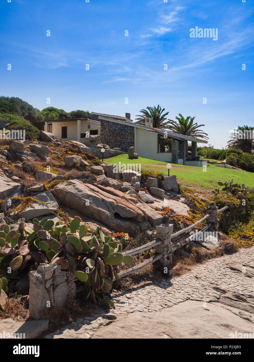 Typical Sardinian landscape with a pedestrian path between the rocks ...
