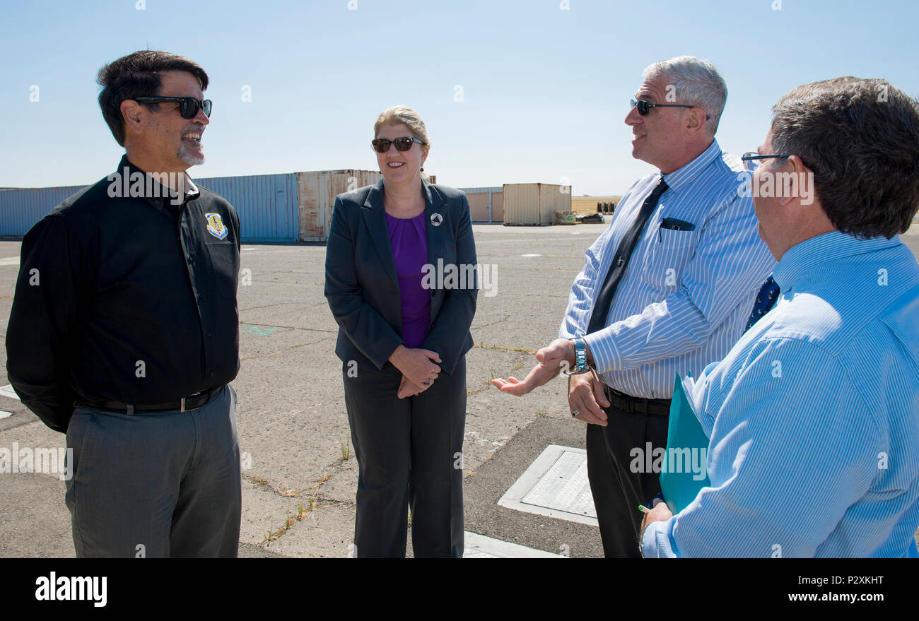 Randy E. Brown, (left) a member of the Senior Executive Service ...