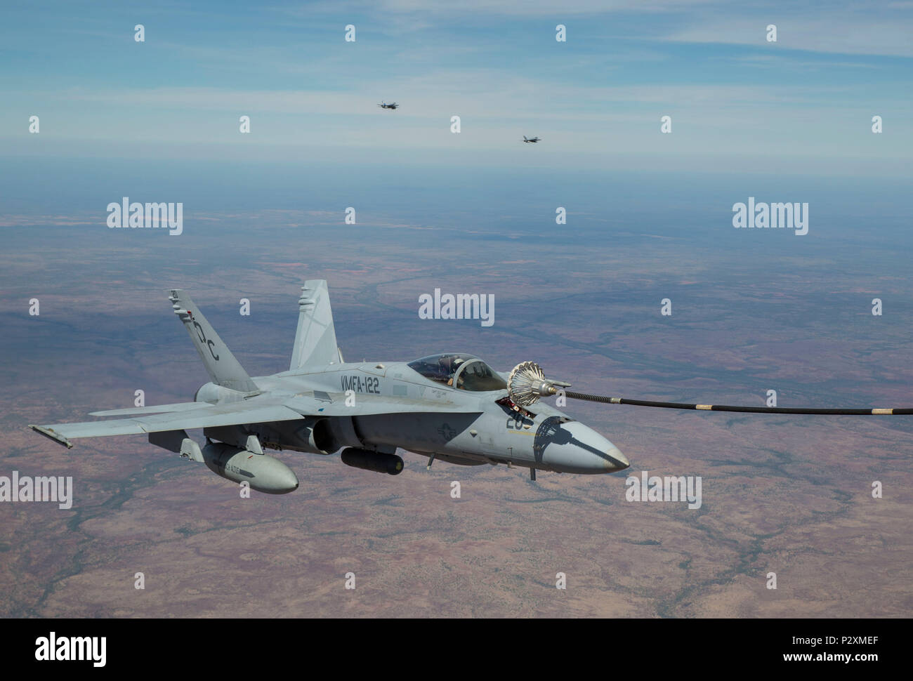 An F/A-18C Hornet with Marine Fighter Attack Squadron (VMFA) 122 conducts an aerial refueling ...