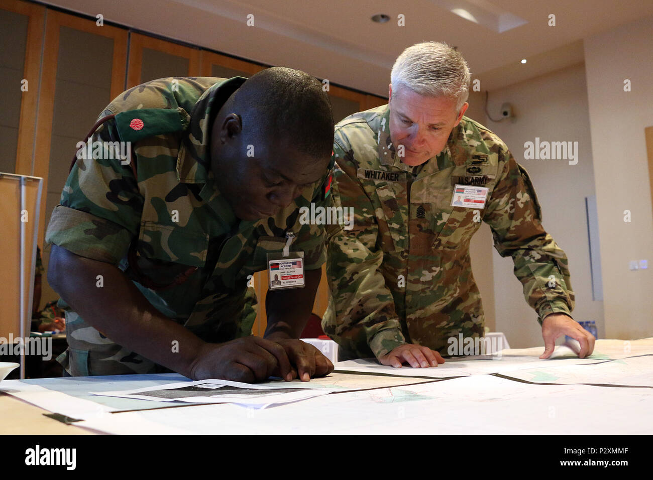 U.S. Army Command Sgt. Maj. Kevin Whitaker (right), command sergeant ...
