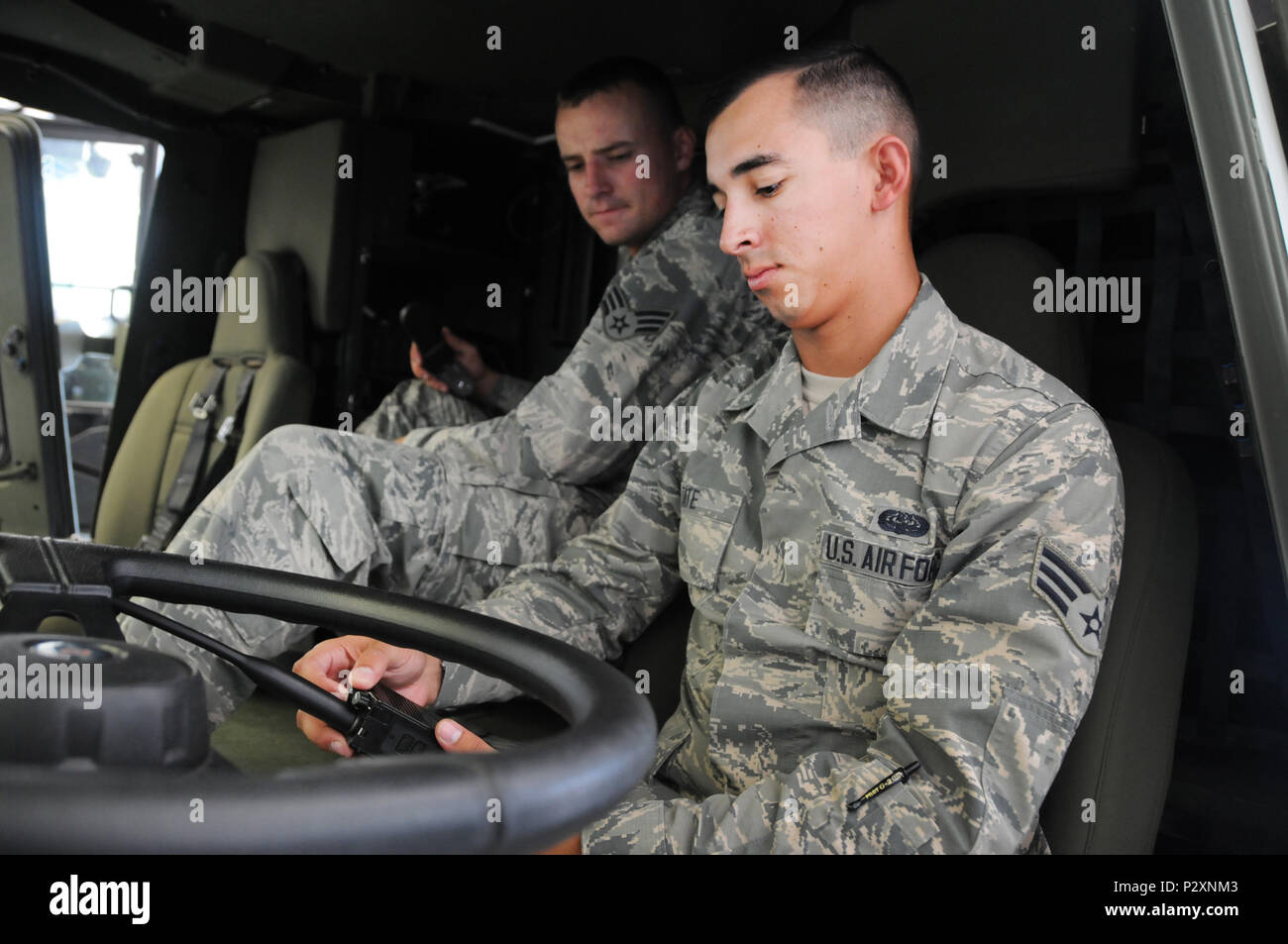Senior Airman Patrick Ast and Senior Airman Keenan Tate, radio ...