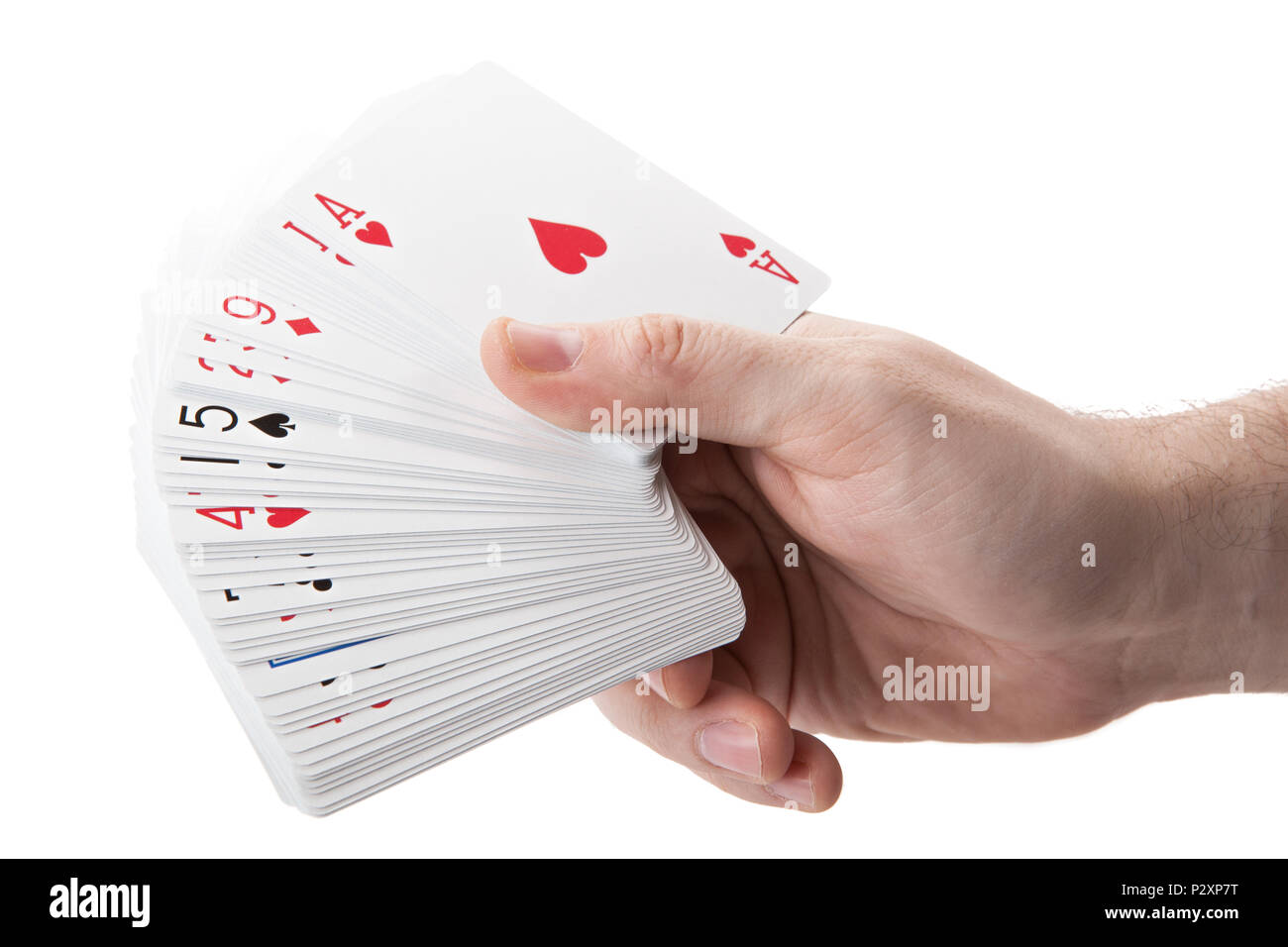 fan of playing cards in hand on a white background isolated Stock Photo ...