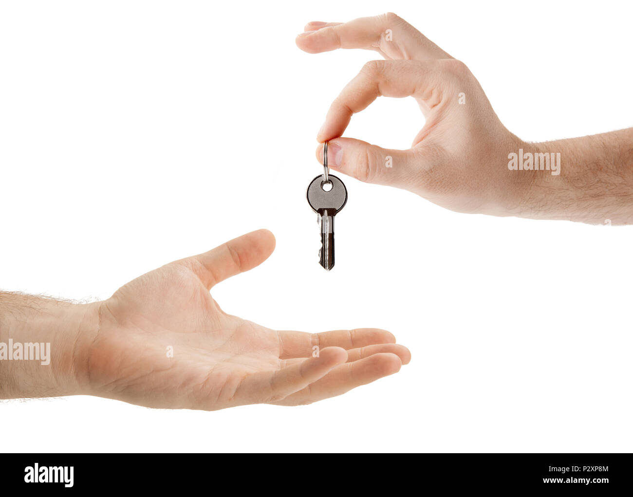 hands over the keys to the apartment from hand to hand closeup isolated ...