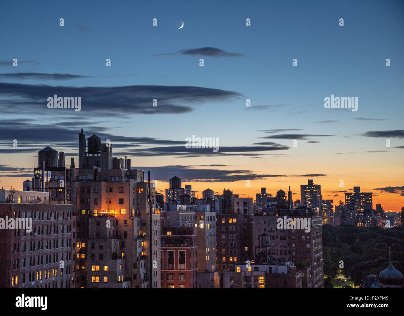 Sunset over New York city Stock Photo - Alamy