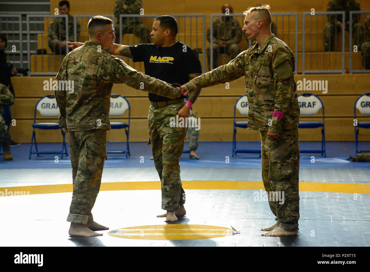 GRAFENWOEHR, Germany – Sgt. Andrew Mackenzie (left) of the 10th Army ...