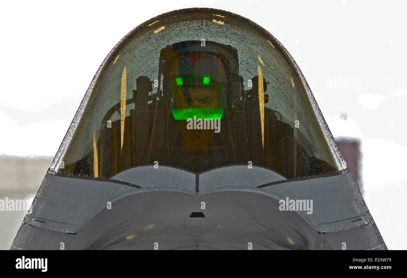 Air Force Lt. Gen. Russell Handy prepares to exit an F-22 Raptor after ...