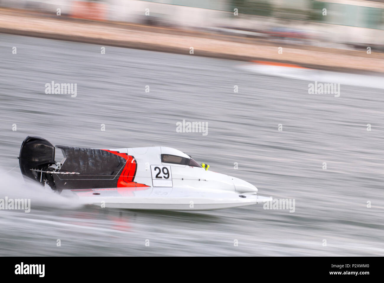 Fast powerboat racing on a river in Portimao, Portugal Stock Photo - Alamy