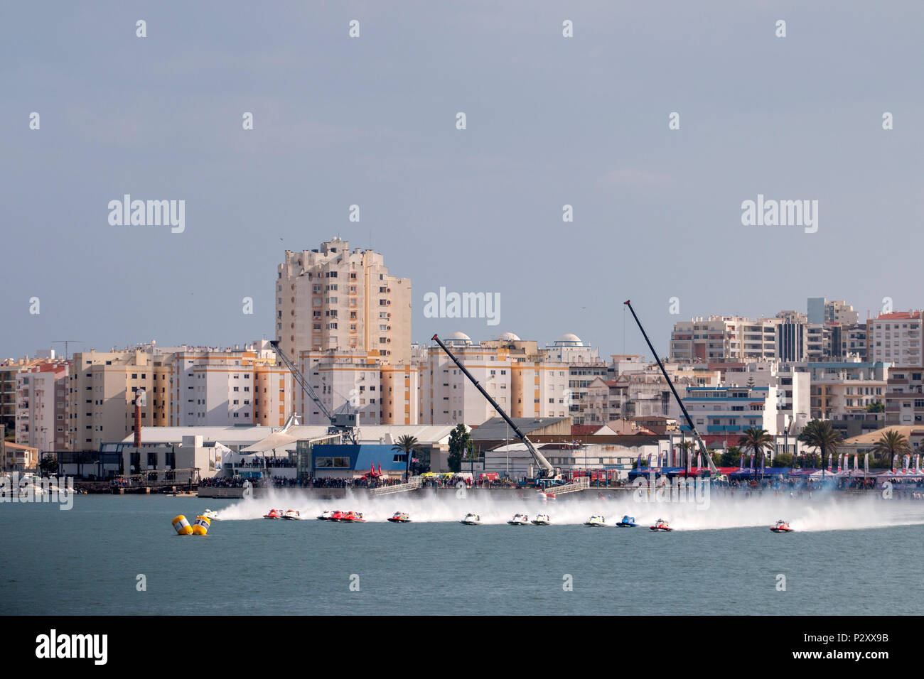 Fast powerboat racing on a river in Portimao, Portugal Stock Photo - Alamy