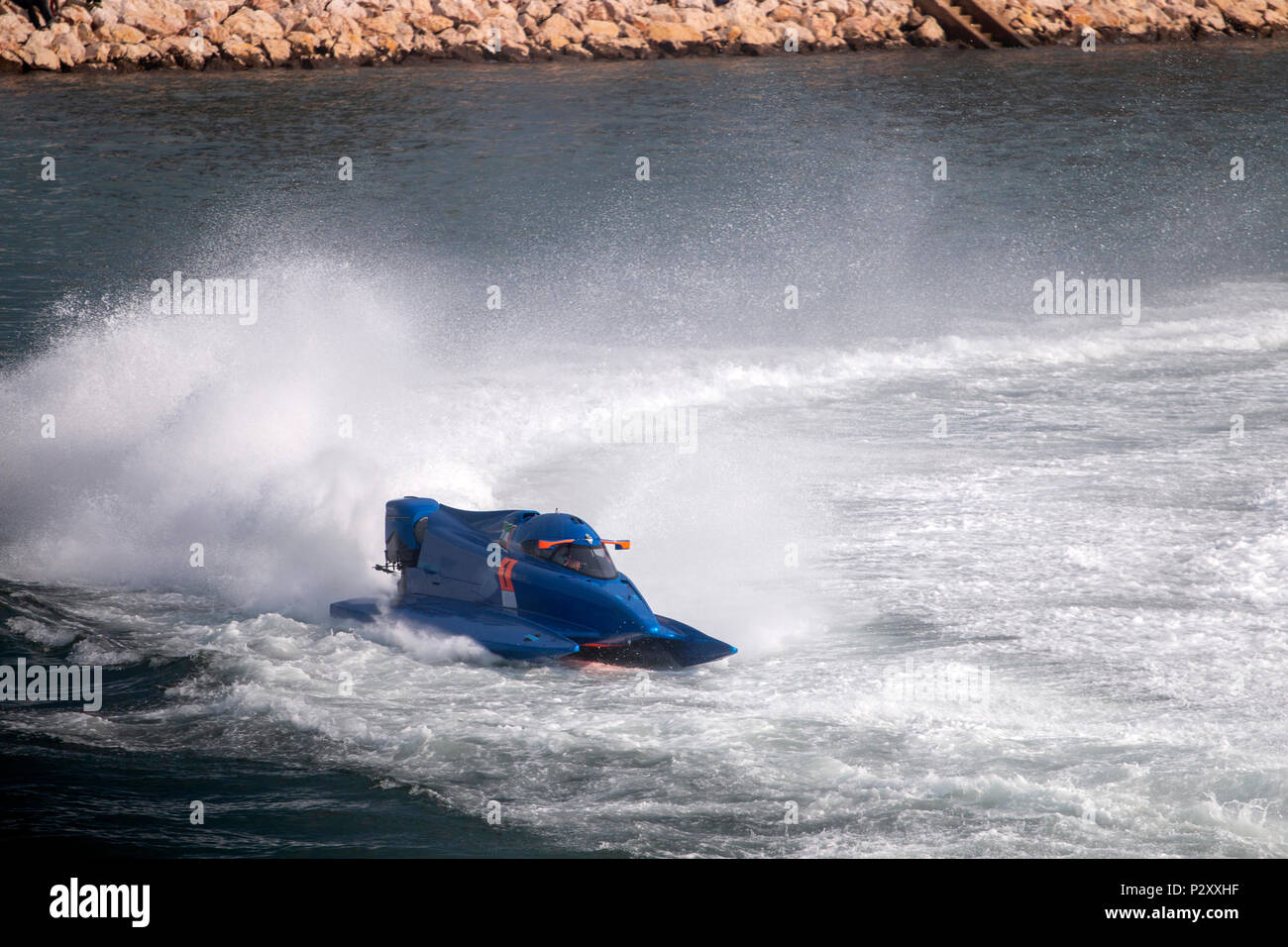 Fast powerboat racing on a river in Portimao, Portugal Stock Photo - Alamy