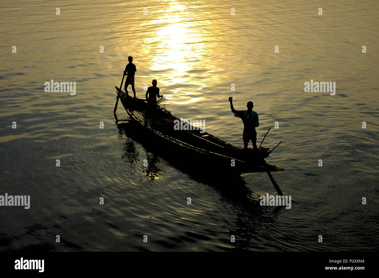 Fishing boat on the Shela River at The Sundarbans, a UNESCO World ...