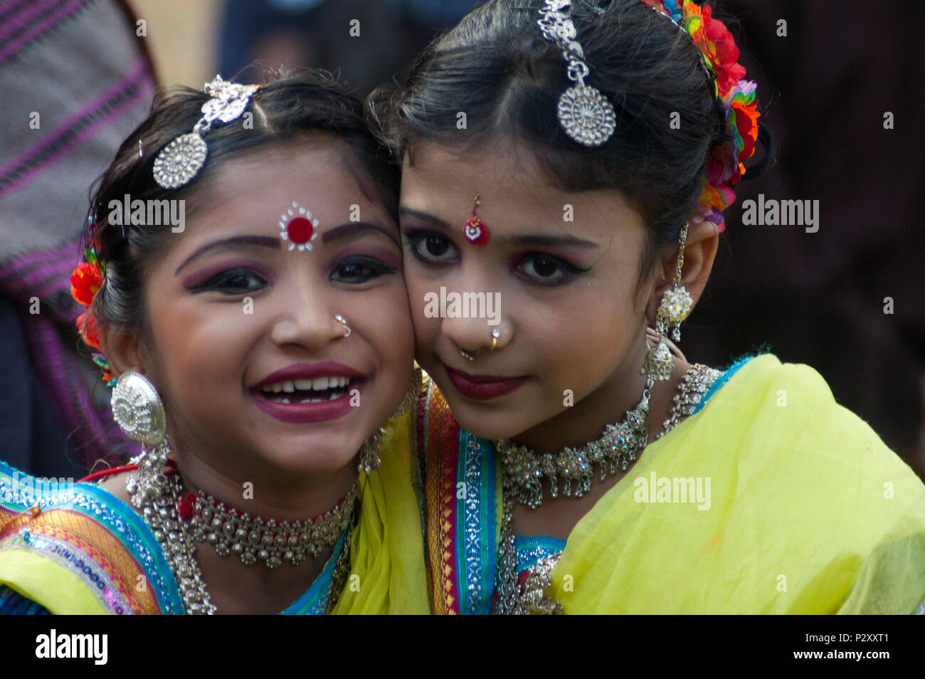 Girls wear traditional costume at Poush Mela 1414 and celebrating ...