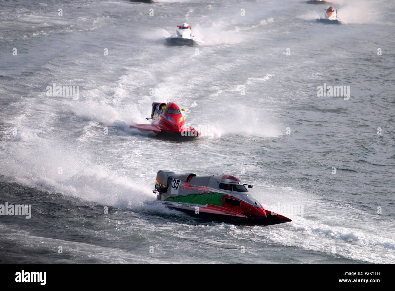 Fast powerboat racing on a river in Portimao, Portugal Stock Photo - Alamy