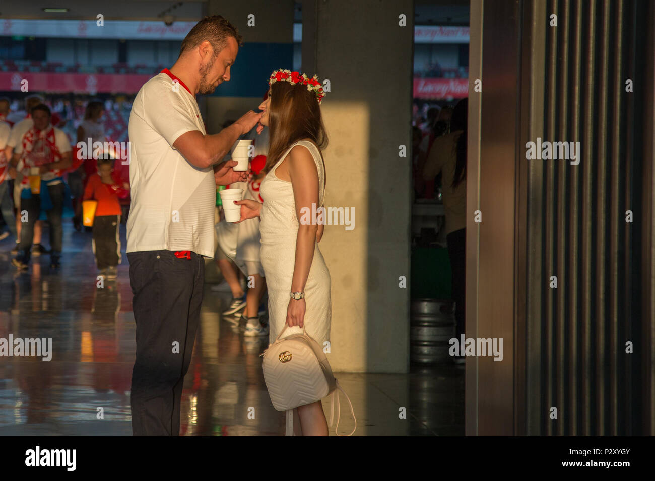 Polish couple football fans at PGE Narodowy, Polish National Stadium in ...