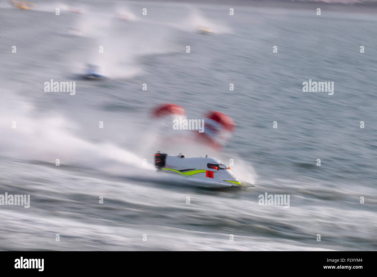 Fast powerboat racing on a river in Portimao, Portugal Stock Photo - Alamy