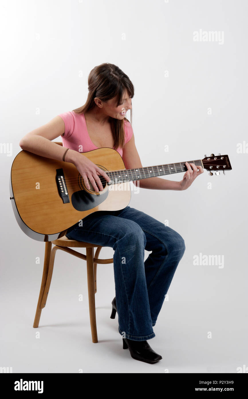 Learning the guitar. Strumming. chords. string, strings, playing Stock ...