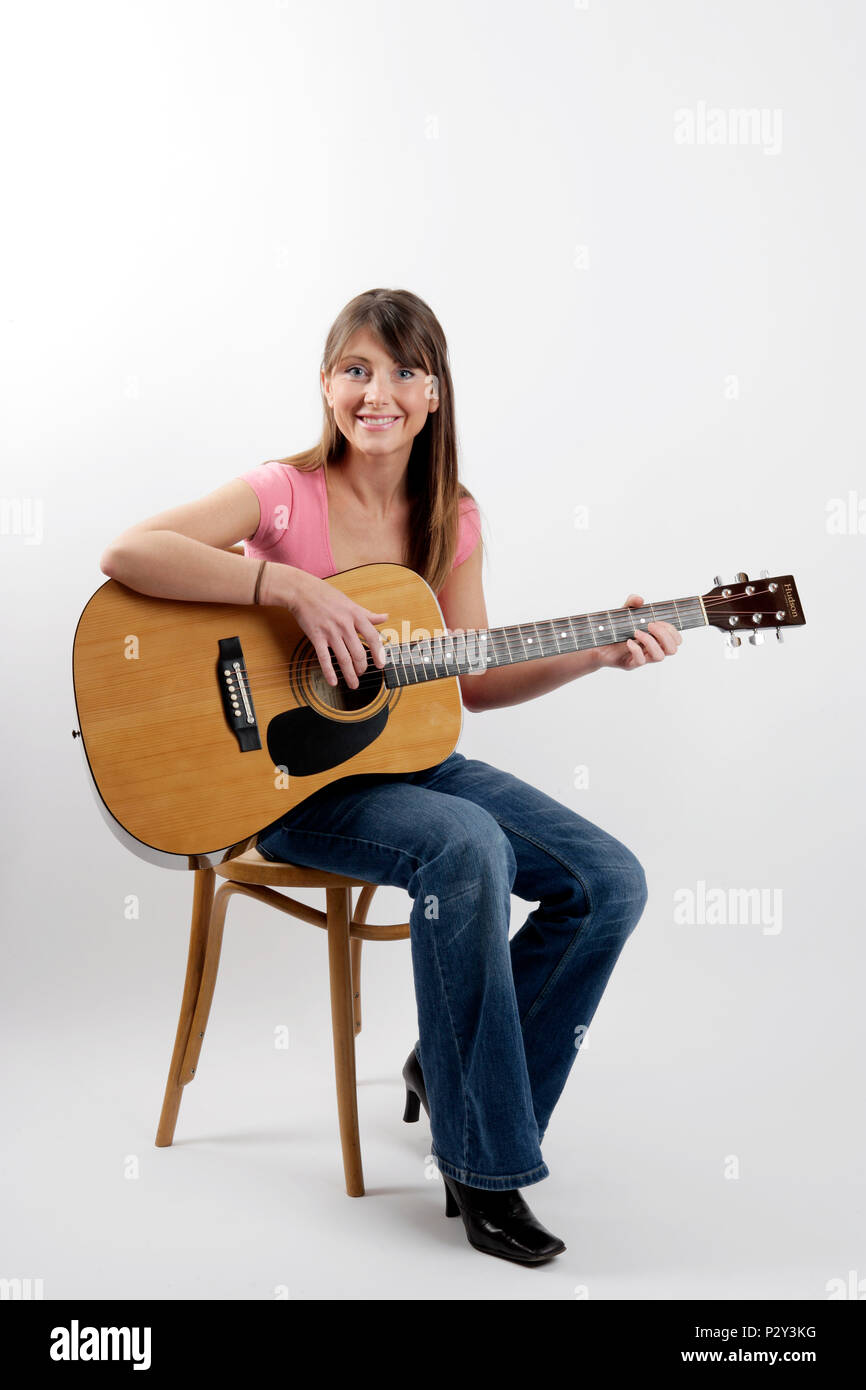 Plucking an instrument hi-res stock photography and images - Alamy