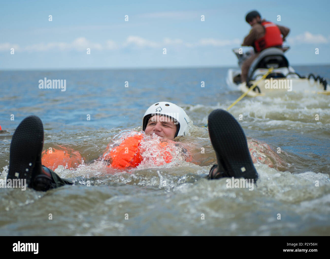 Tech. Sgt. Marc Dougherty, 326th Airlift Squadron loadmaster, drags ...