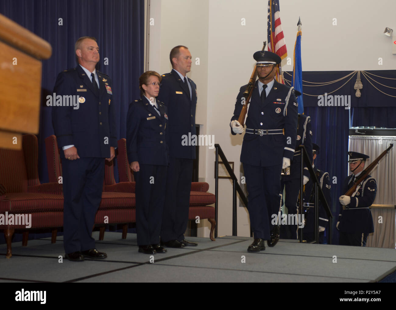 Honor Guard members from the 512th Airlift Wing present the colors to ...