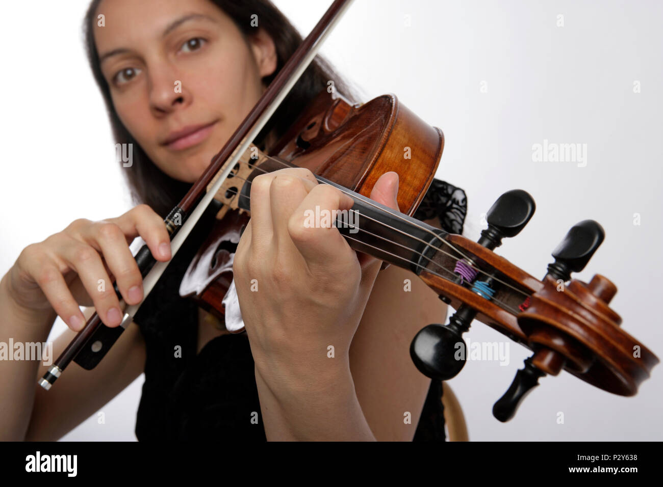 Generic - Viola player playing with the bow Stock Photo - Alamy