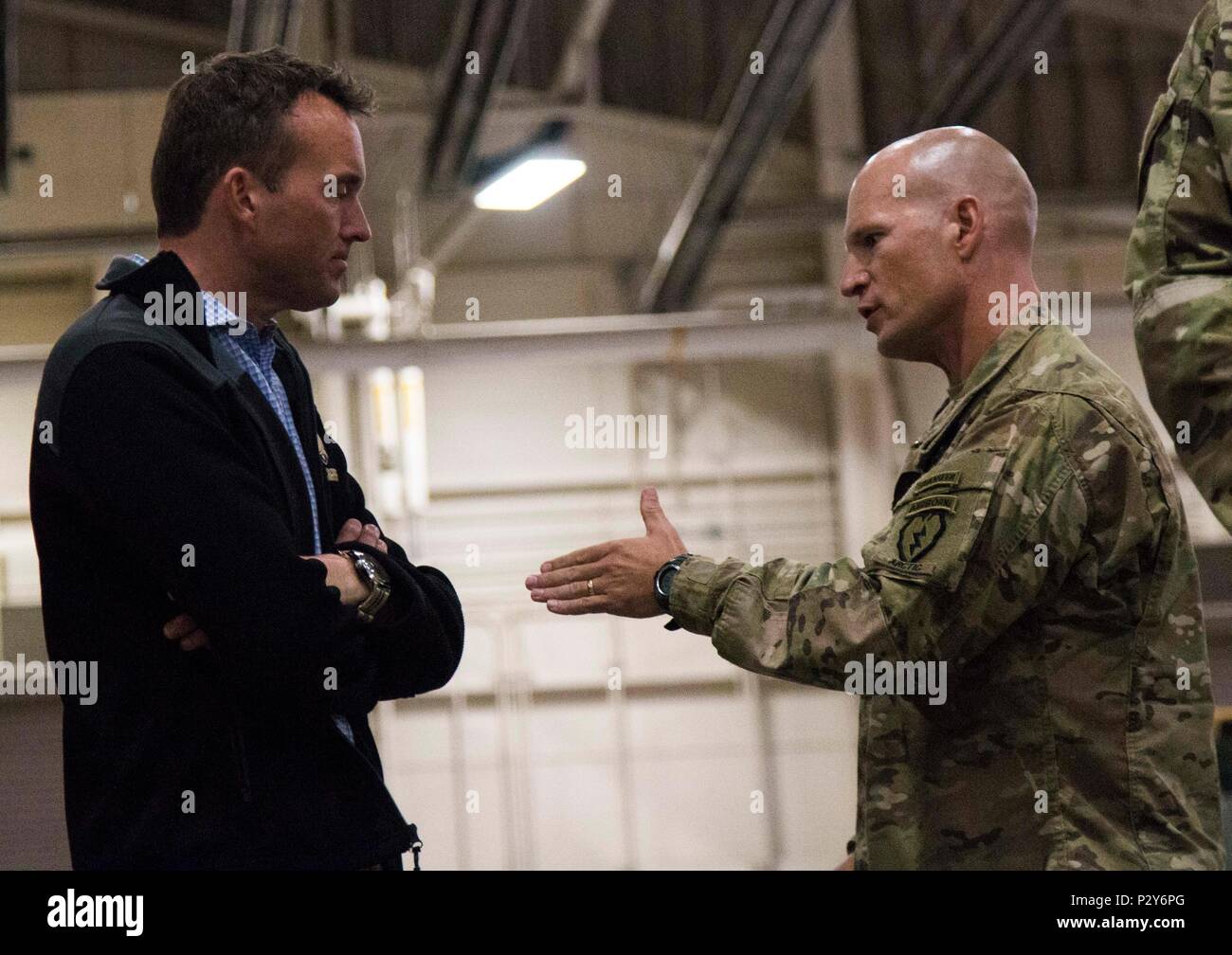 Secretary of the Army Eric Fanning and Col. Scott Green, commander of ...