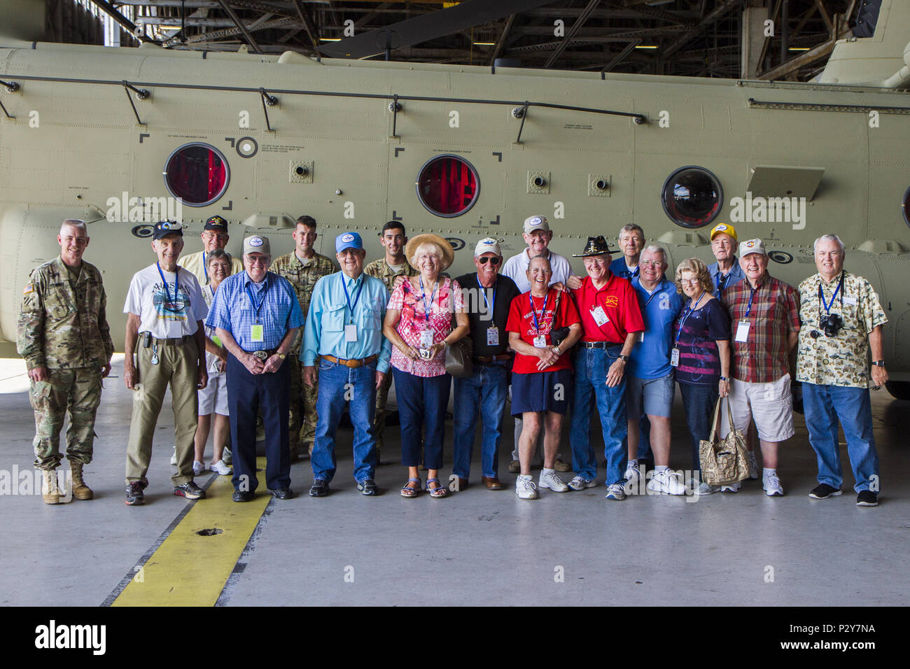 Members from the Army Otter Caribou Association reunite with each other ...