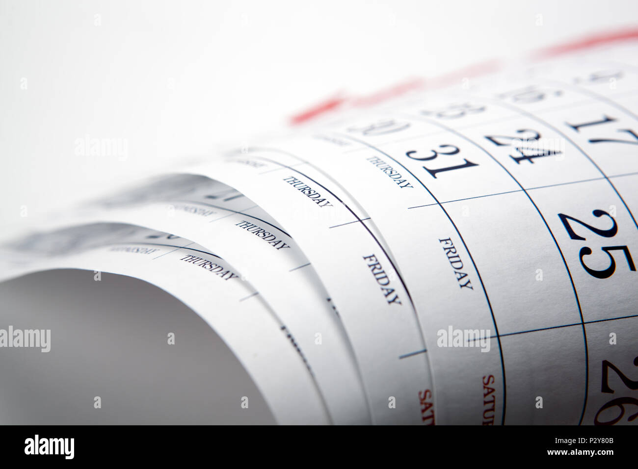 pile of printed wall calendar sheets closeup Stock Photo - Alamy