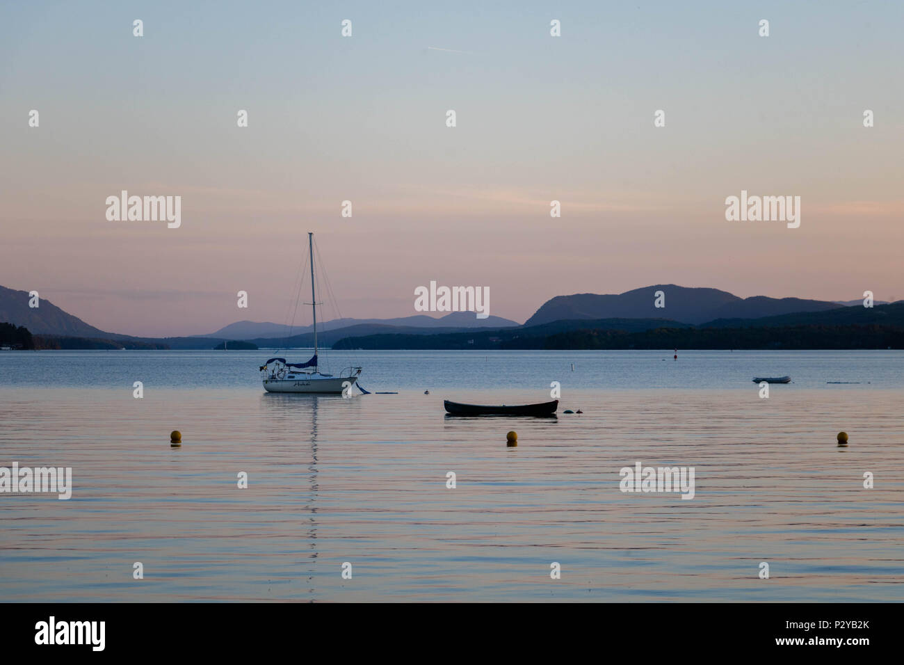Lake Magog at sundown. Boats on Lake Magog Stock Photo - Alamy