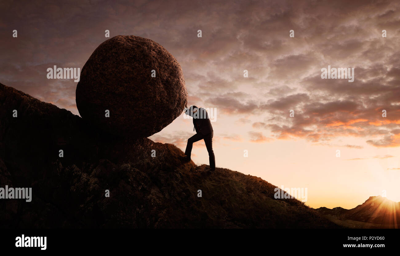 Pushing rock hi-res stock photography and images - Alamy