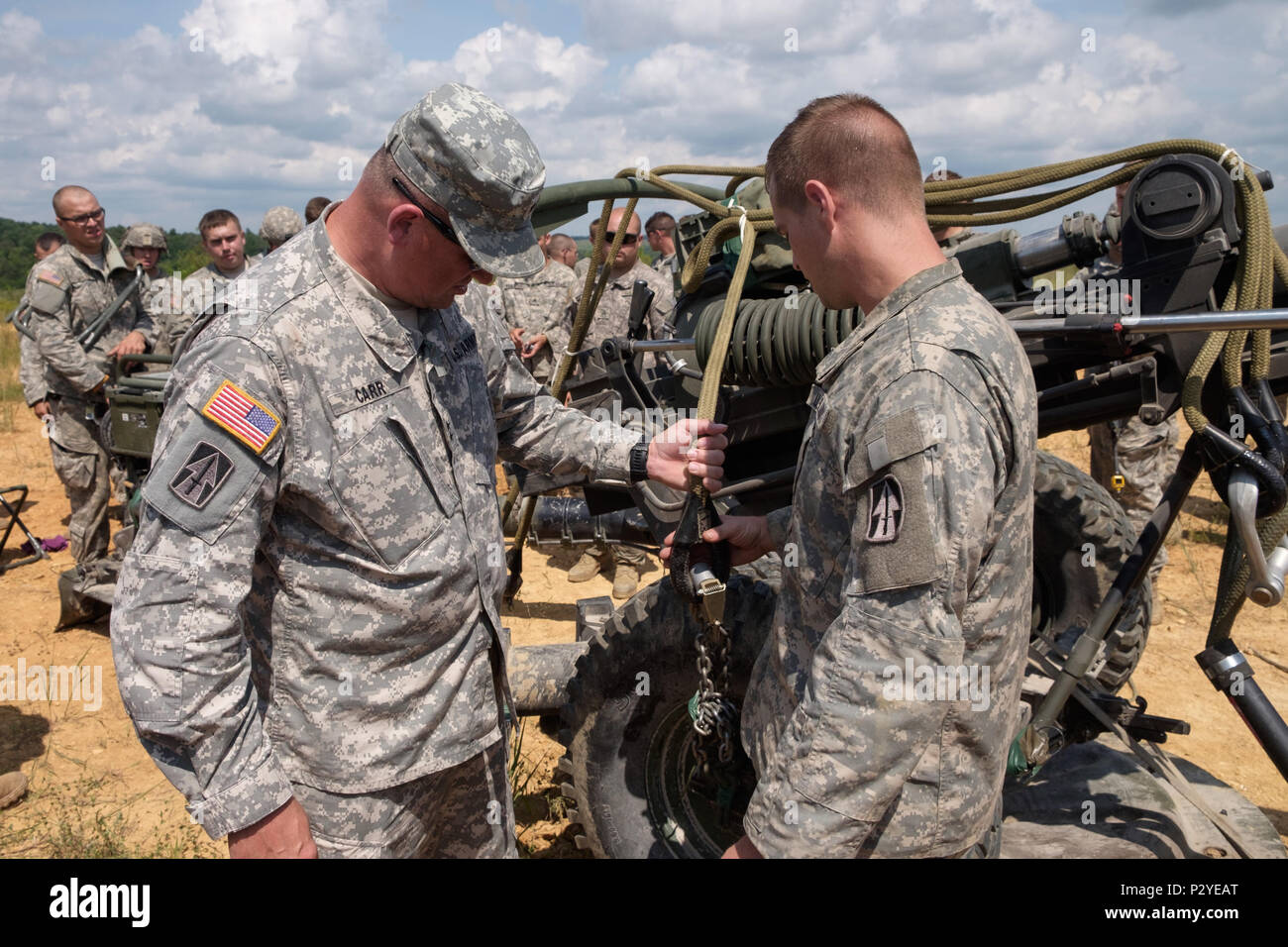 Sgt. 1st Class Groth of Alpha Battery, 1-163rd Field Artillery explains artillery sling load ...