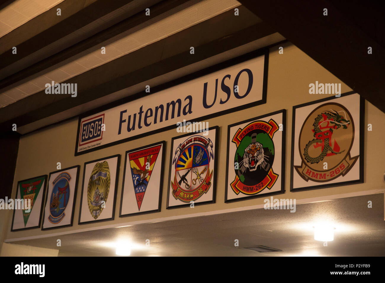 A United Services Organization sign hangs over an English discussion ...