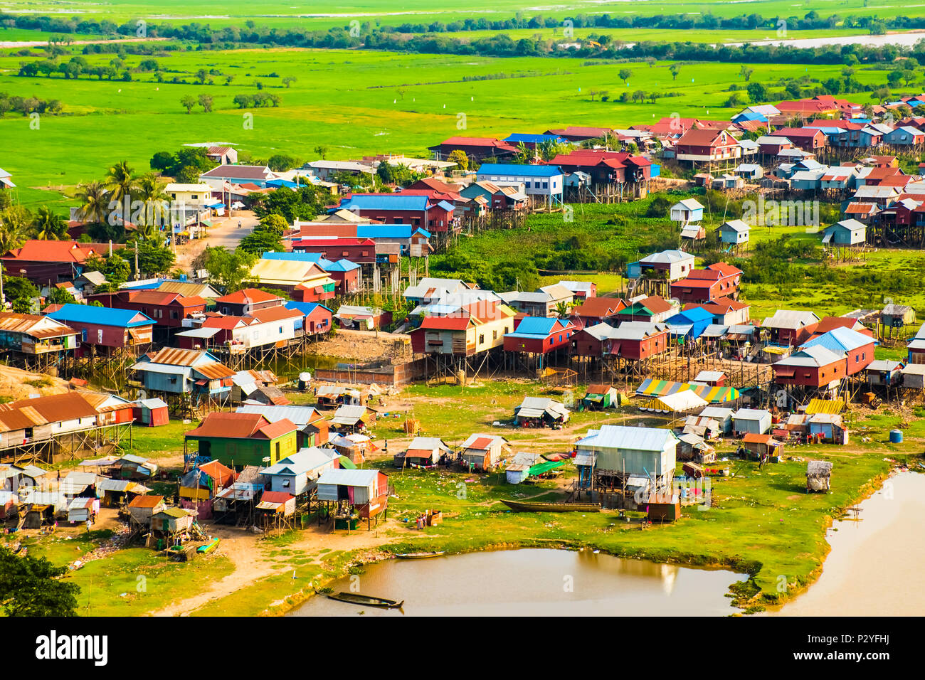 Floating village Phnom Krom, green rice fields, Tonle Sap, Siem Reap ...