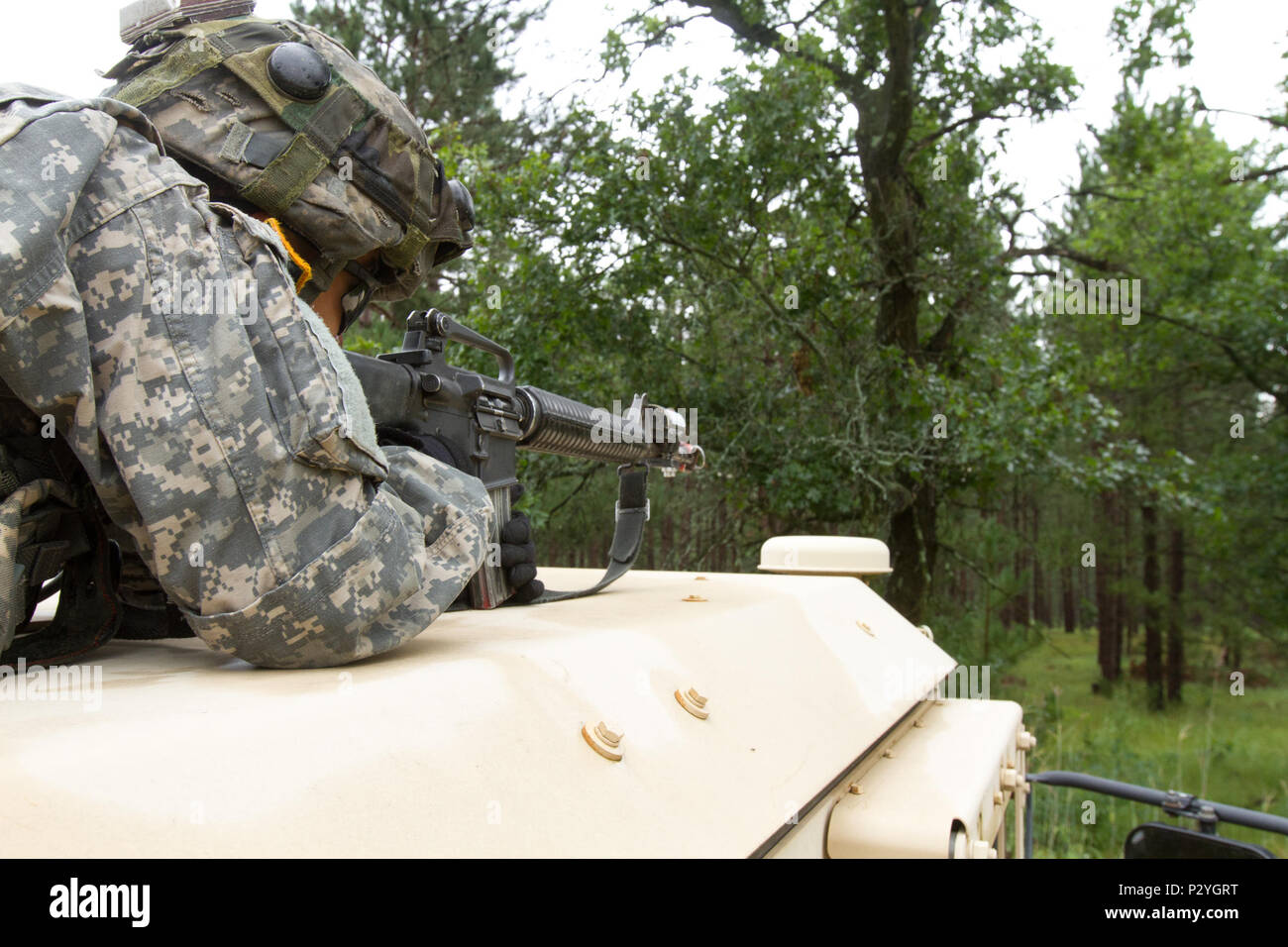 U.S. Army Spc. Nguyen Pham, 652nd Engineer Company, Hammond, WI, pulls ...