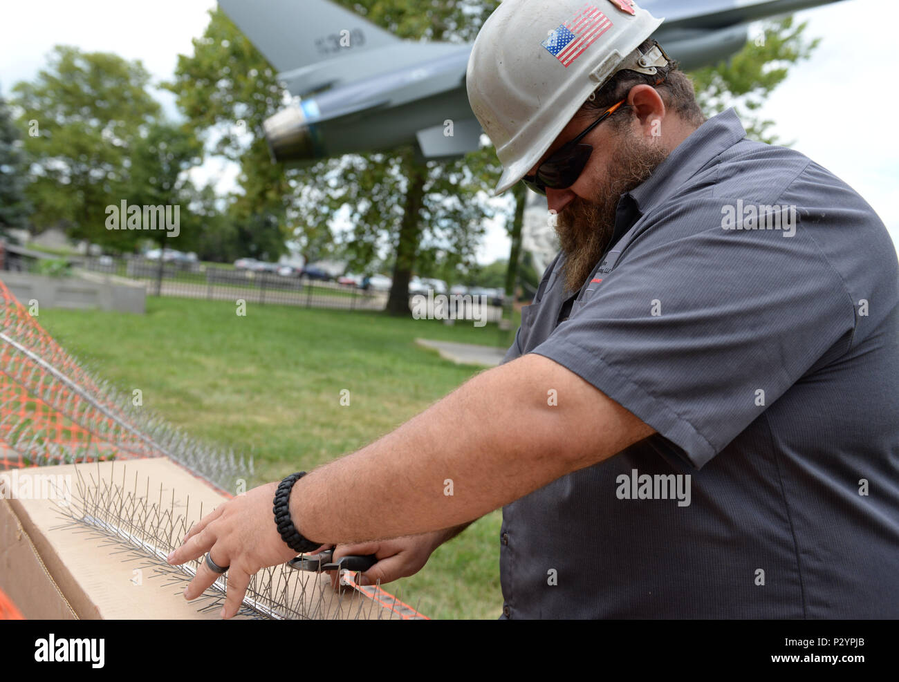A contractor for the 88th Civil Engineering Group customizes bird wire ...