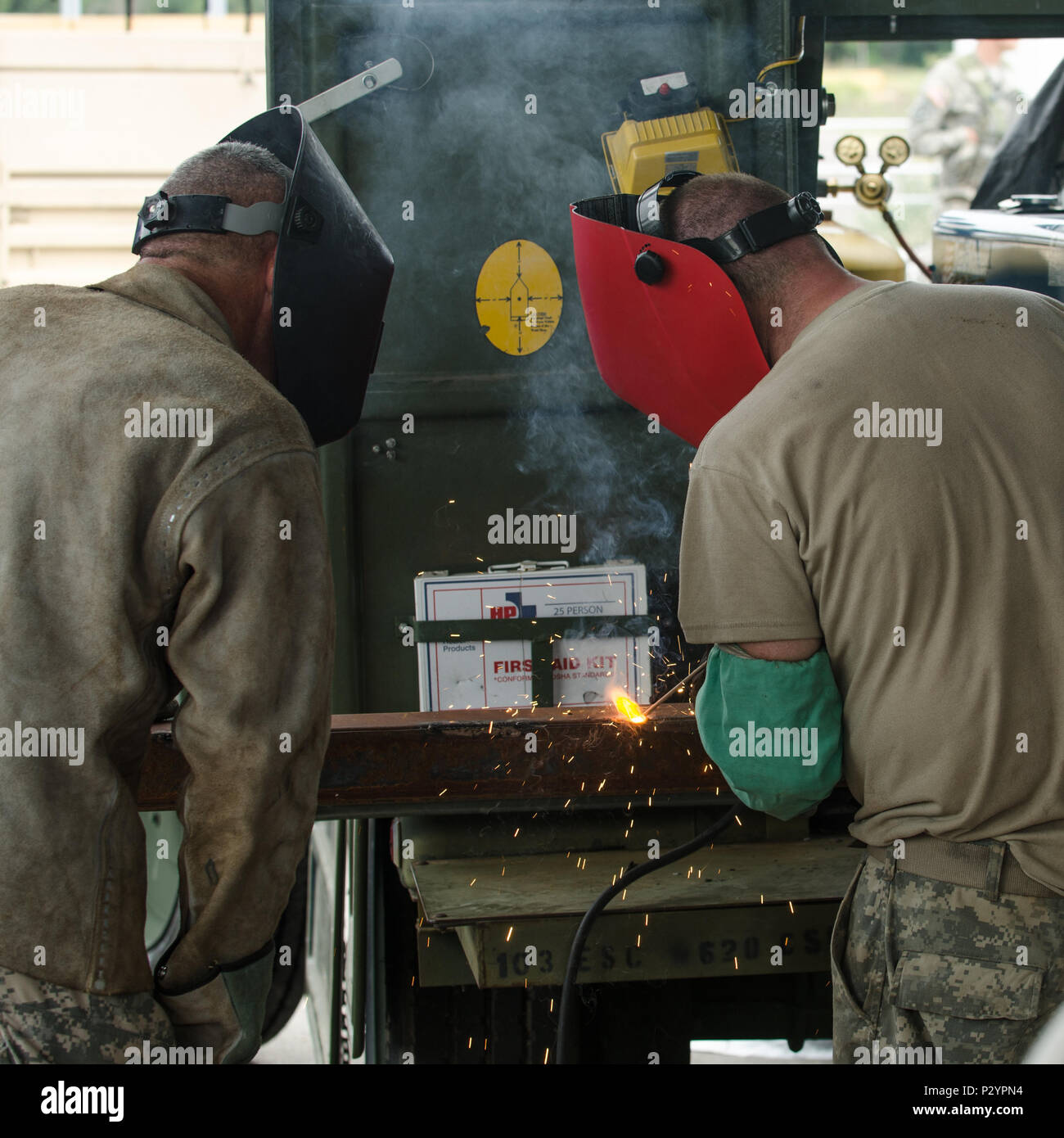 U.S. Army Reserve Sgt. David Burton (left) and Pvt. Justin Shanks ...