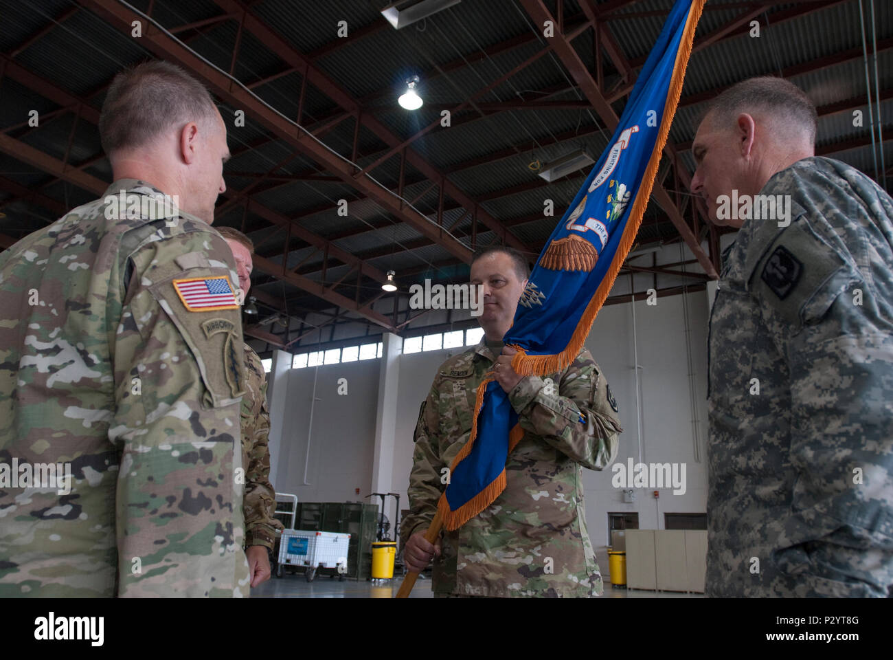 Lt. Col Andrew S. Rendon holds the colors of the 1st Battalion, 185th ...