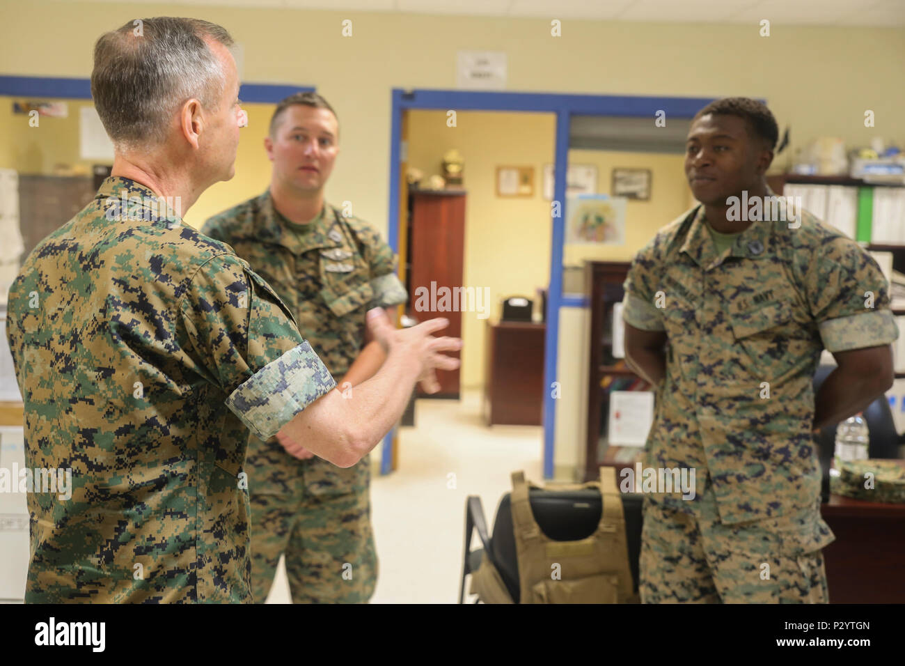 Navy Rear Adm. Stephen Pachuta, left, the Medical Officer of the Marine ...