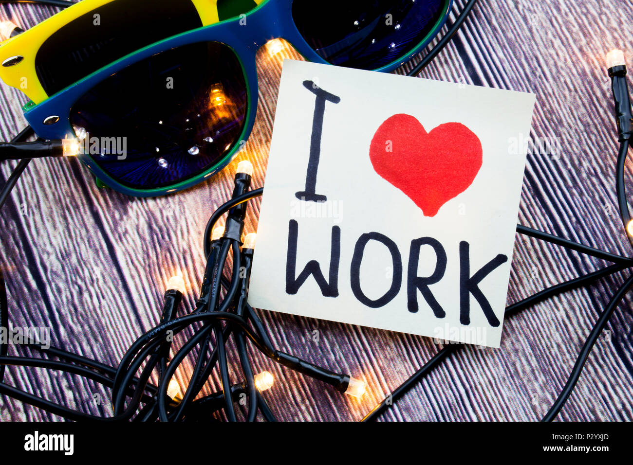 I love work Heart handwritten on white paper with black color and heart ...