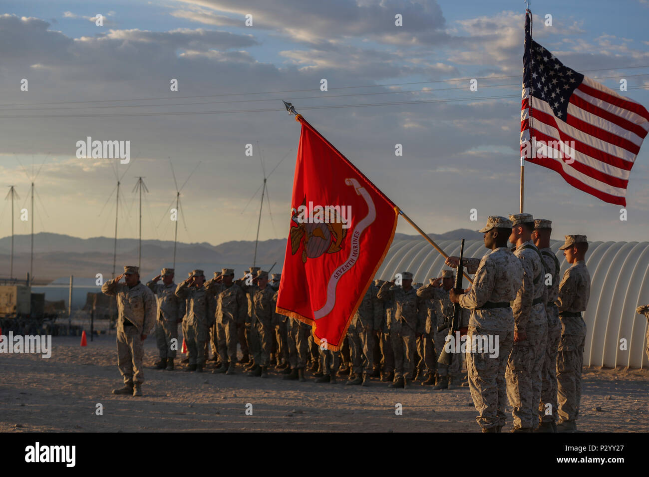 Marines of 7th Marine Regiment, 1st Marine Division, salute as the ...