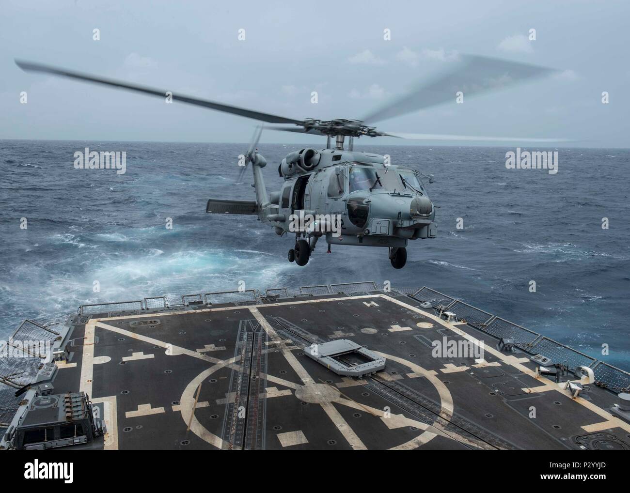 160813-N-SU278-059 SOUTH CHINA SEA (Aug. 13, 2016) An MH-60R helicopter ...