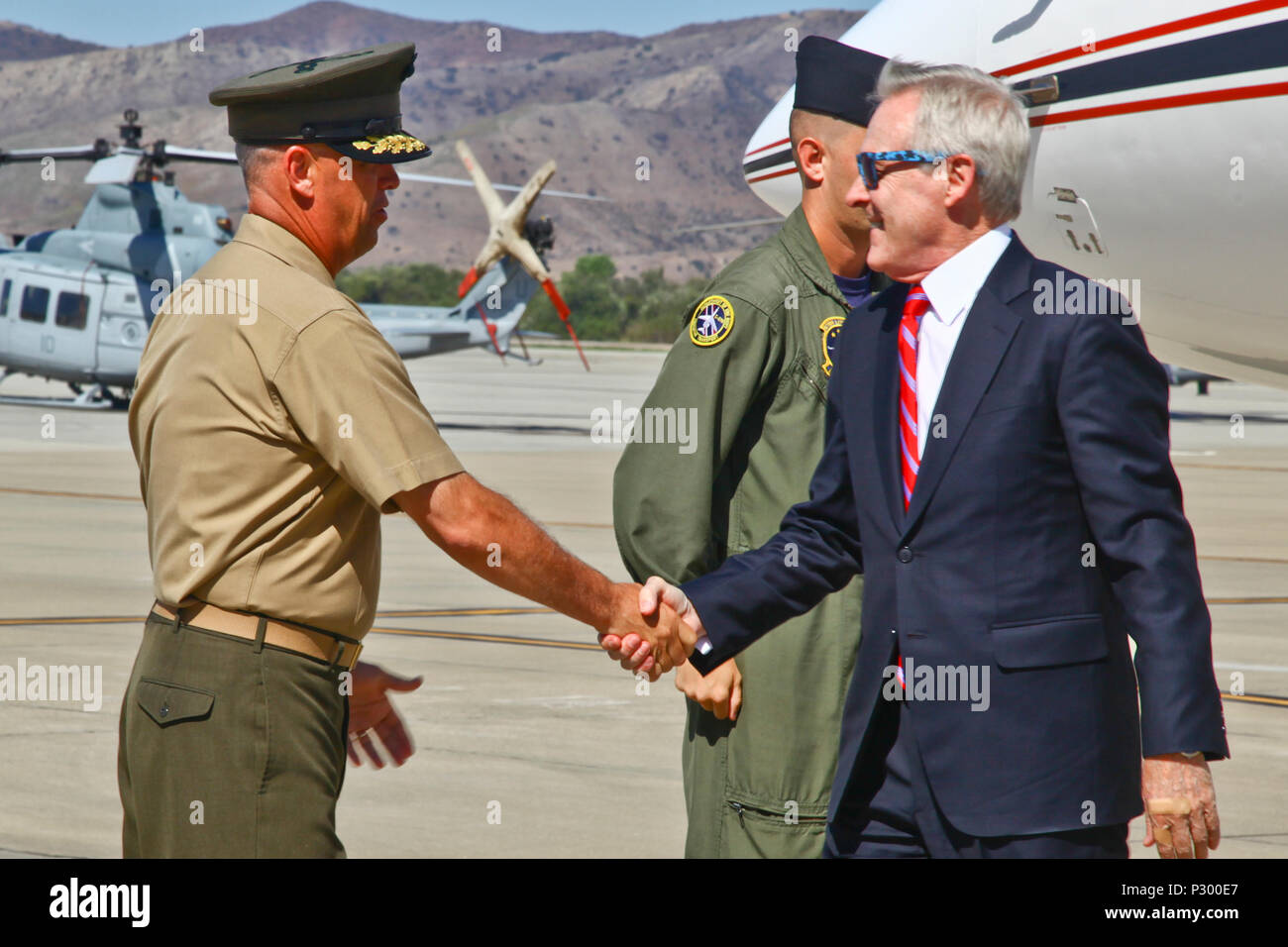 Secretary of the Navy Ray Mabus shakes hands with U.S. Marine Corps ...