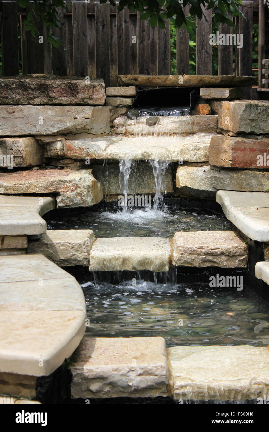 A quiet waterfall with lots of limestone rocks Stock Photo - Alamy